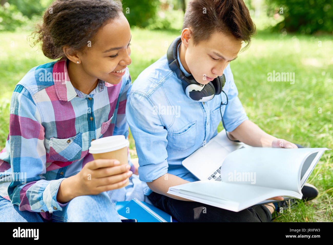 Boy doing homework outside hi-res stock photography and images - Alamy