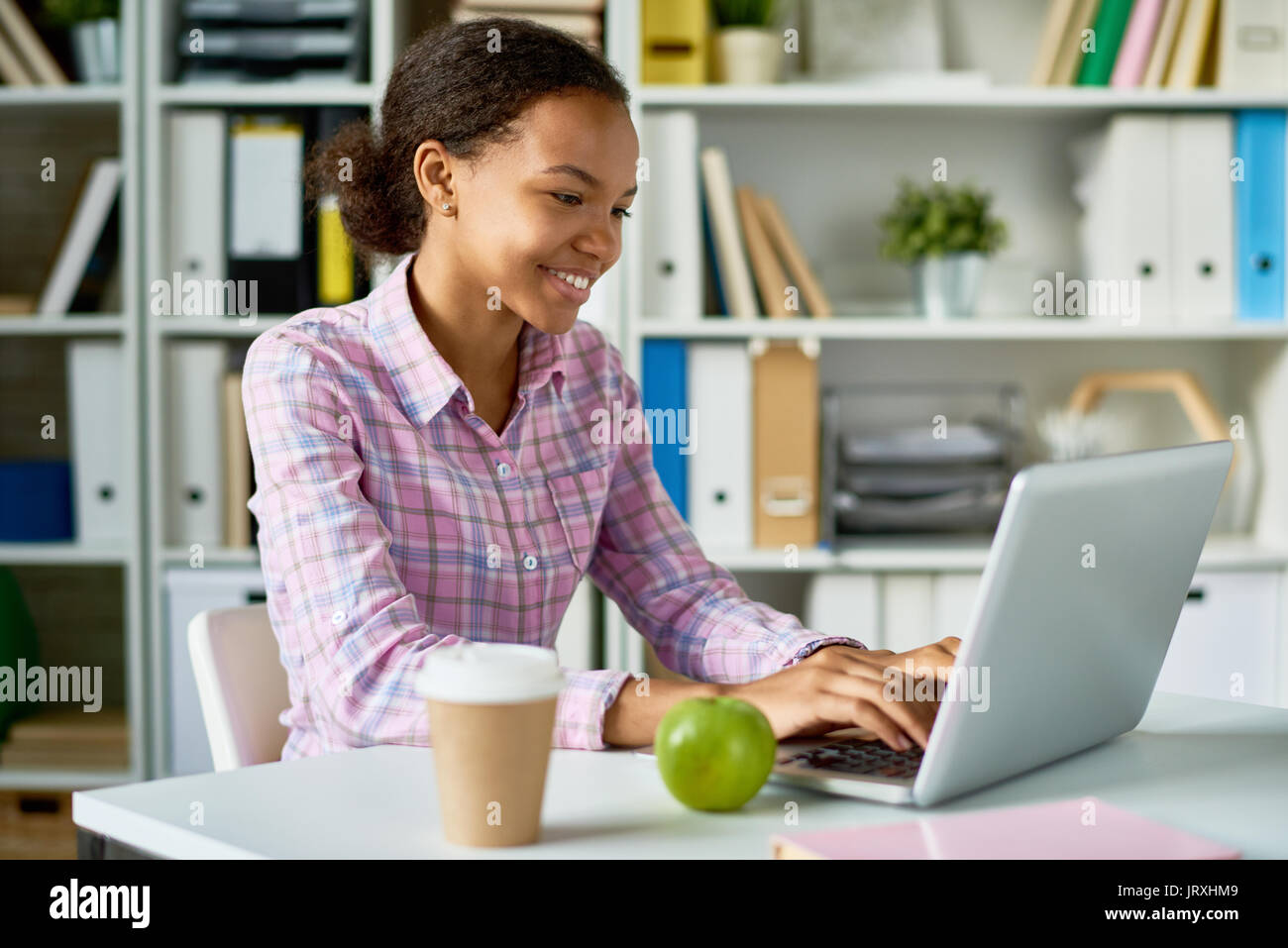 Smiling African Girl Studying in Library Stock Photo - Alamy