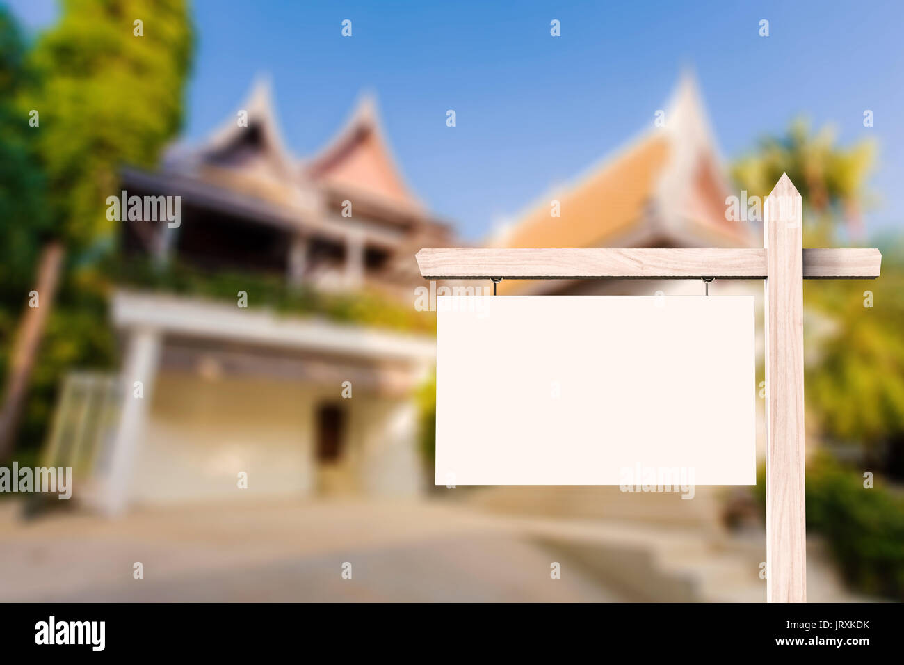 blank white sign with exterior house background Stock Photo - Alamy