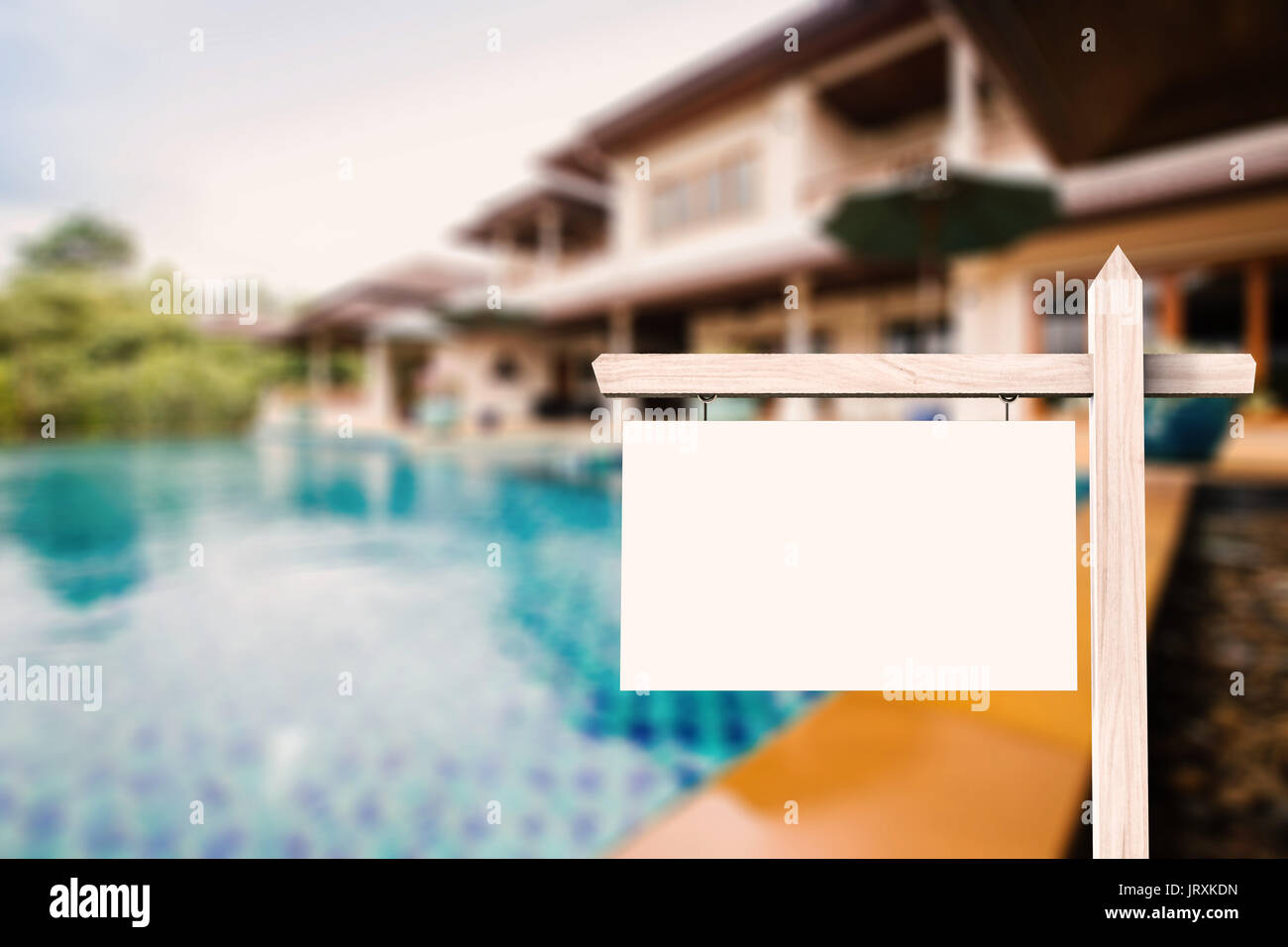 blank white sign with exterior house background Stock Photo - Alamy