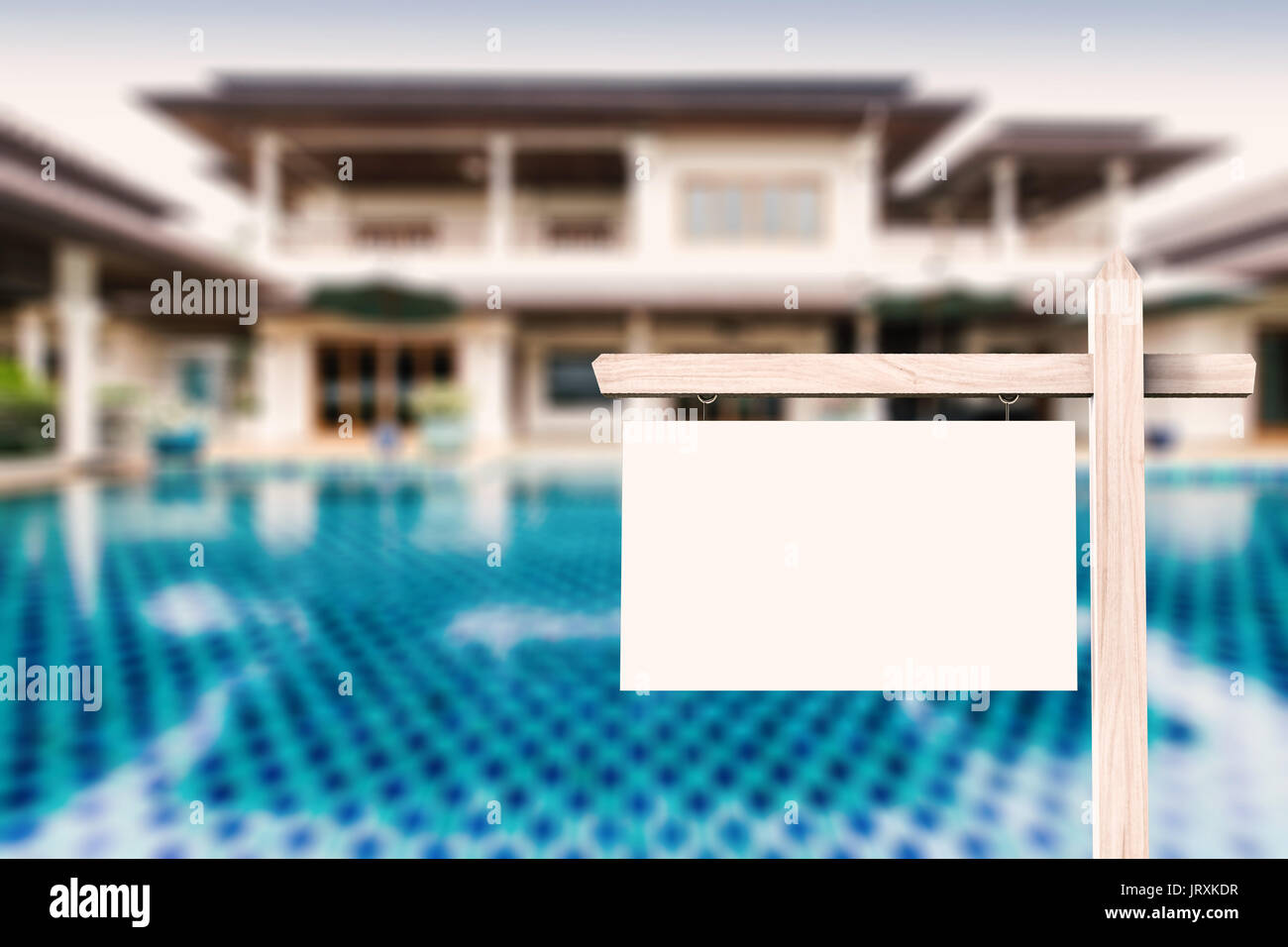 blank white sign with exterior house background Stock Photo - Alamy