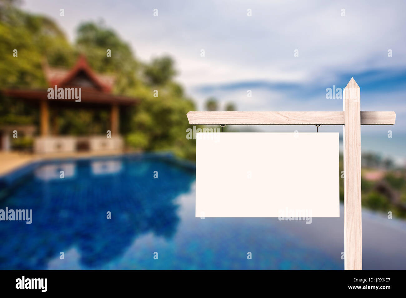 blank white sign with exterior house background Stock Photo - Alamy