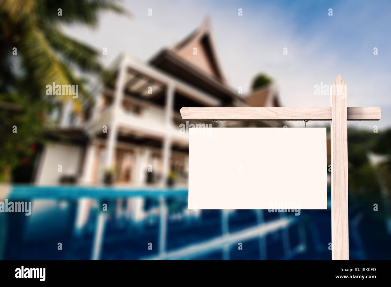 blank white sign with exterior house background Stock Photo - Alamy