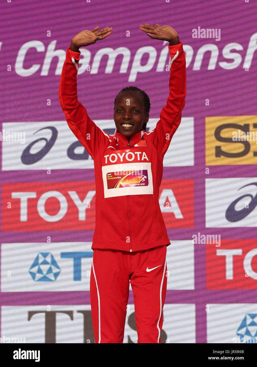 Bahrain's Rose Chelime with her gold medal in the Wome'n's marathon ...