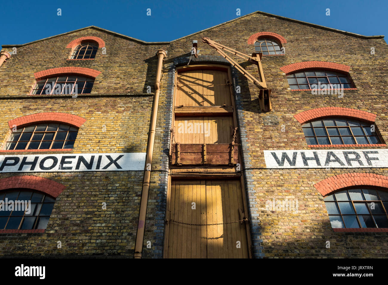 Phoenix Wharf, a converted warehouse on Wapping Wall, London, UK Stock ...