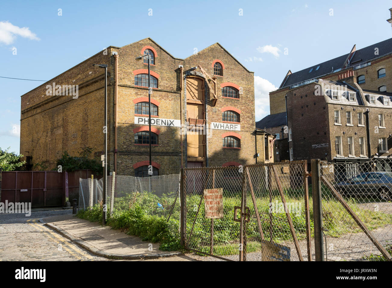 Phoenix Wharf, a converted warehouse on Wapping Wall, London, UK Stock ...