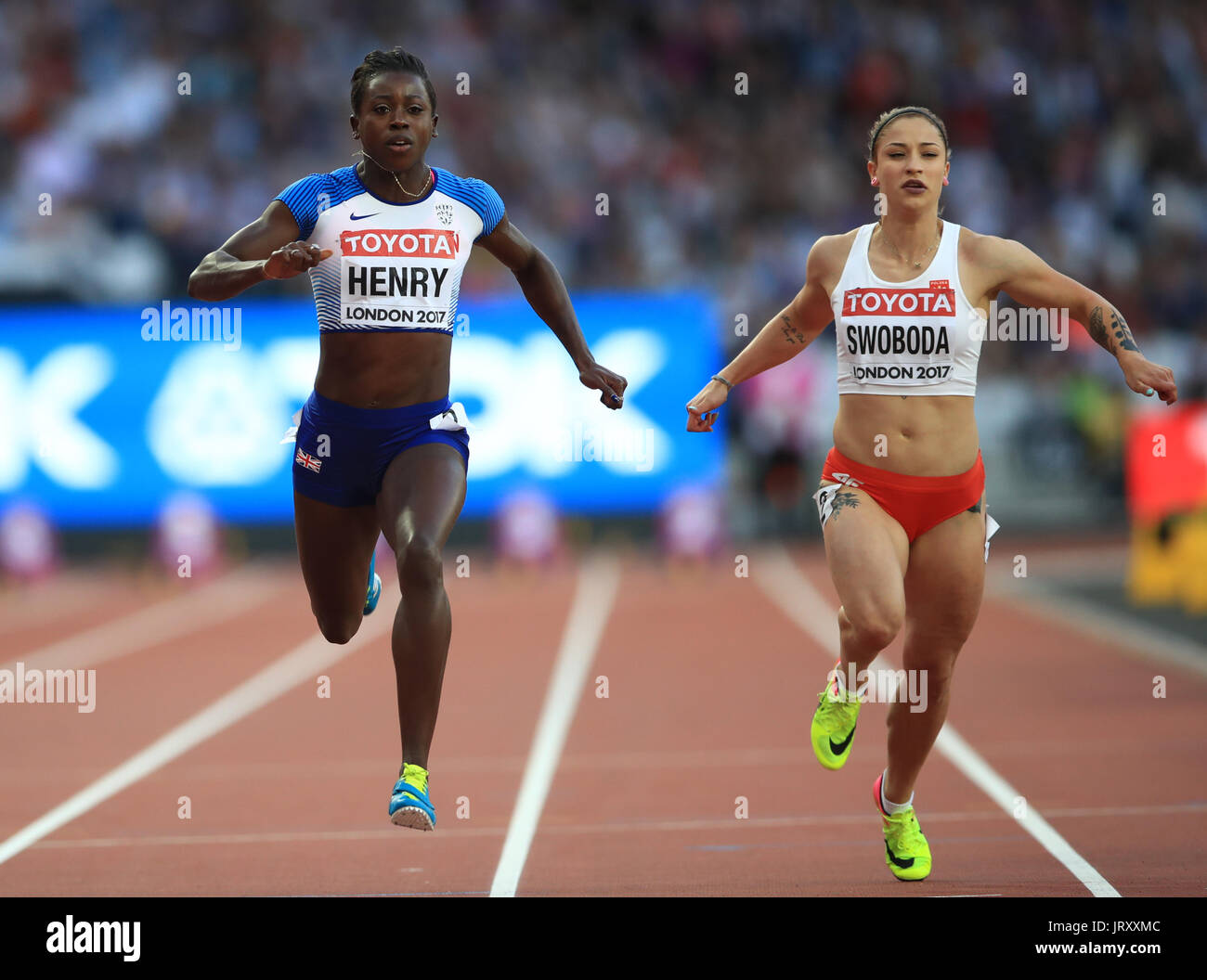 Great Britain's Desiree Henry (left) and Poland's Ewa Swoboda in the ...
