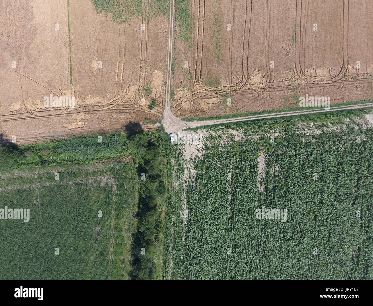 Crossroads paved roads through the fields. View from above Stock Photo ...