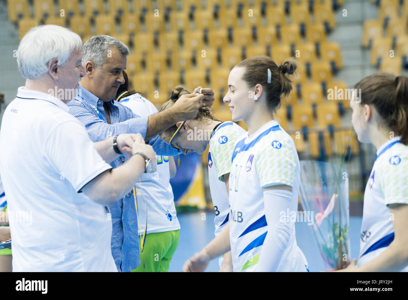 Girls sports team celebrating medals hi-res stock photography and ...