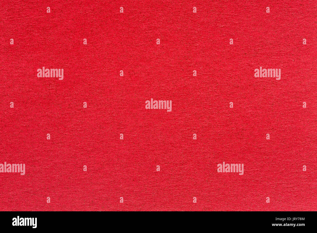 A textured red background with a subtle screen pattern Stock Photo - Alamy