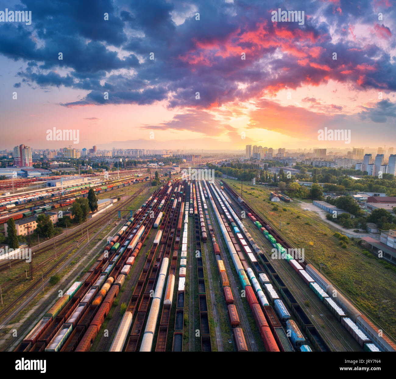 Cargo trains. Aerial view of colorful freight trains. Railway station ...