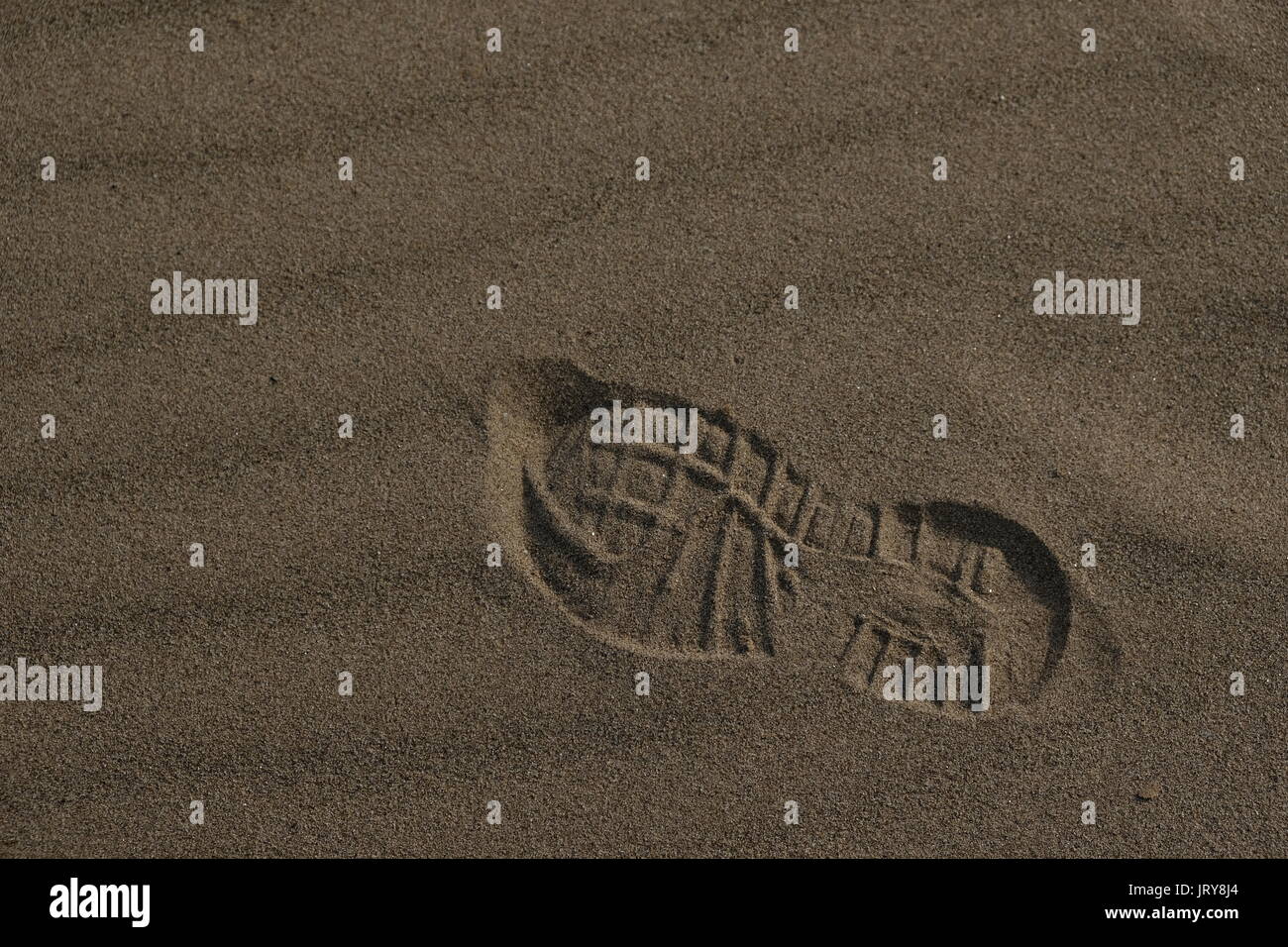 Foot print on sand Stock Photo - Alamy