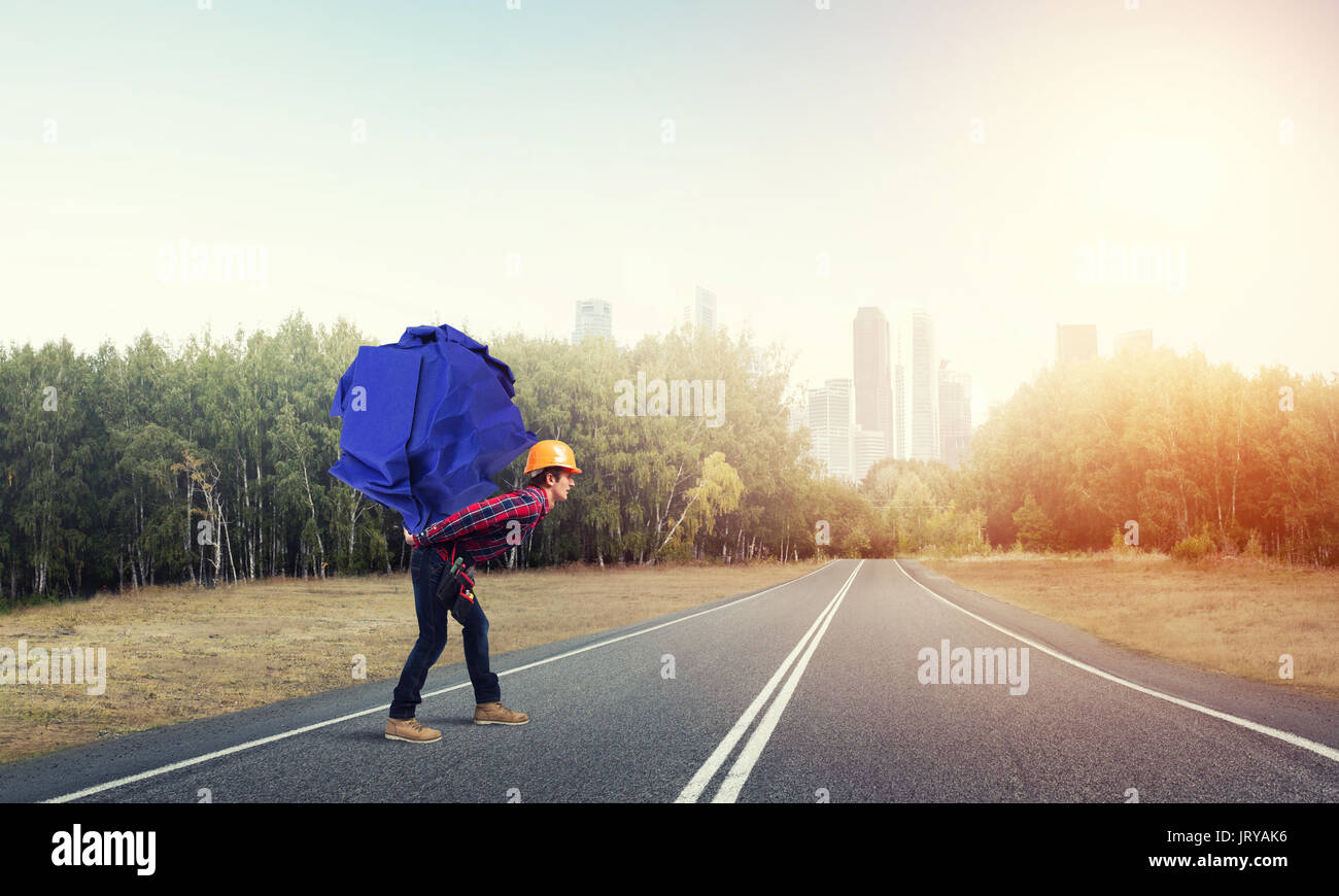 Engineer man carry load Stock Photo - Alamy