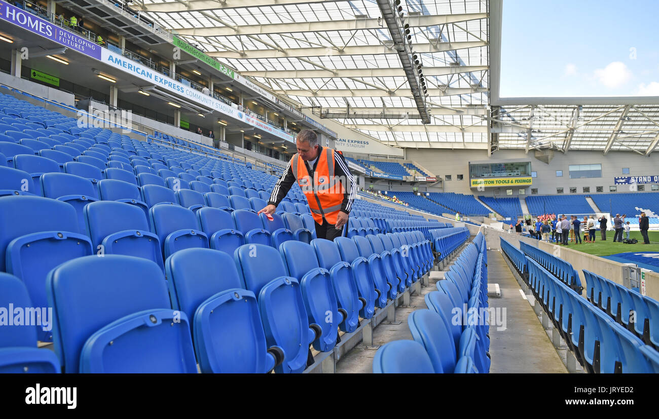 Ground staff prepare the stadium for the Friendly match between ...