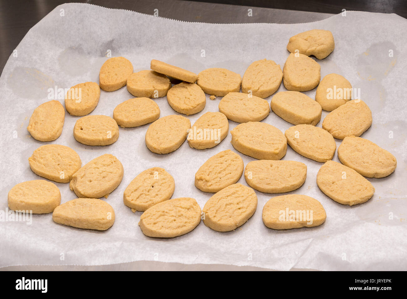 Mini Shortbread biscuits on a backing tray Stock Photo - Alamy