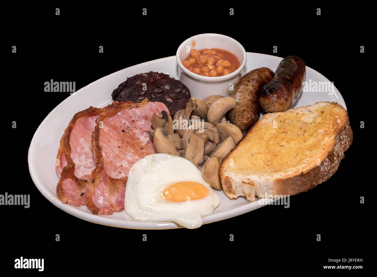 Welsh breakfast isolated on a black background Stock Photo - Alamy