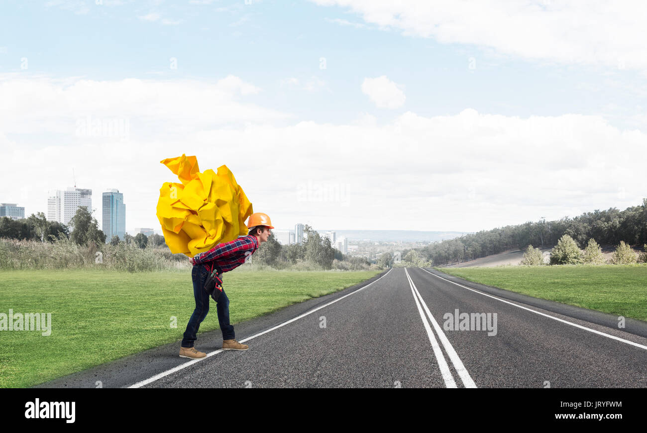 Engineer man carry load Stock Photo - Alamy