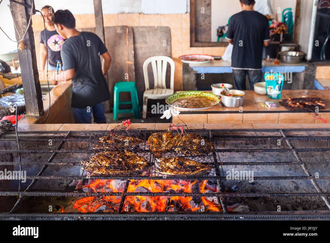 Grilled fresh seafood: parrot fish, octopus, shrimp food background ...
