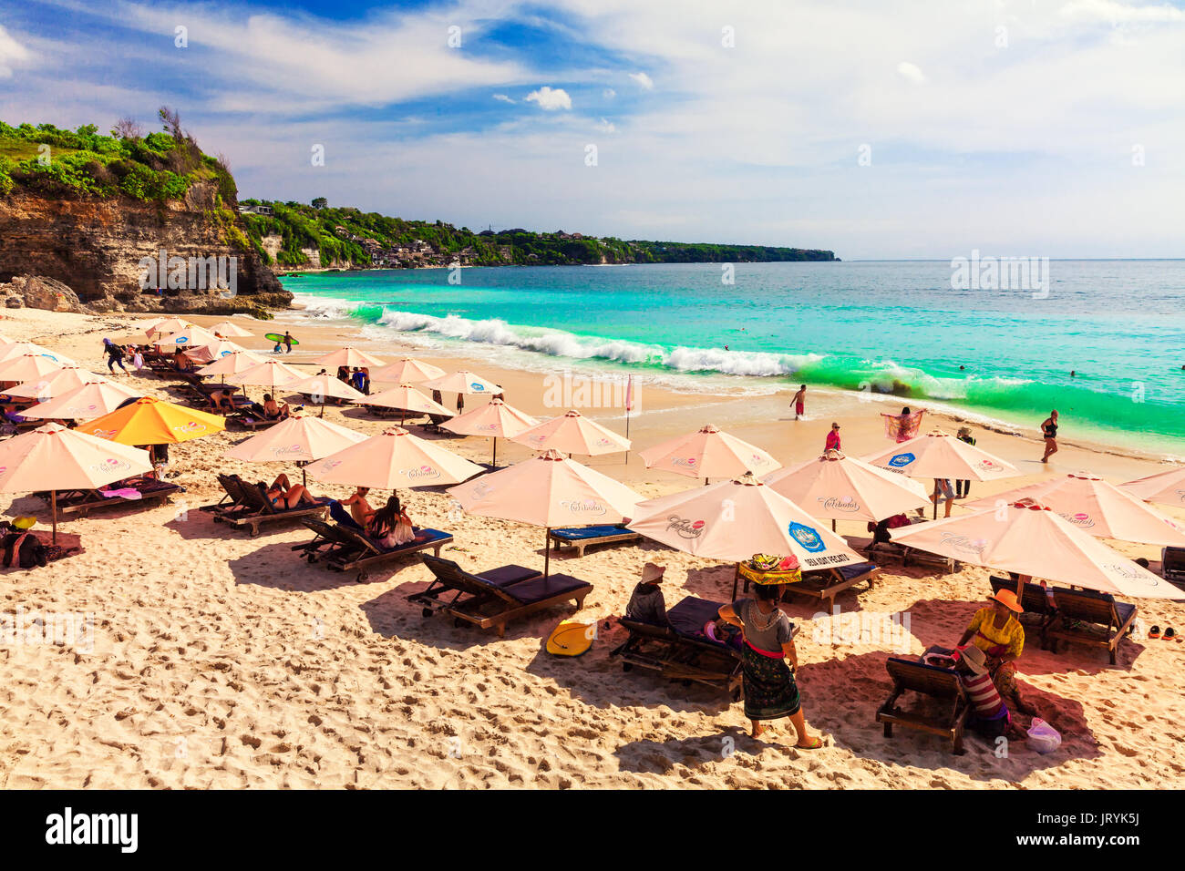 Bali seascape with huge waves at beautiful hidden white sand beach ...