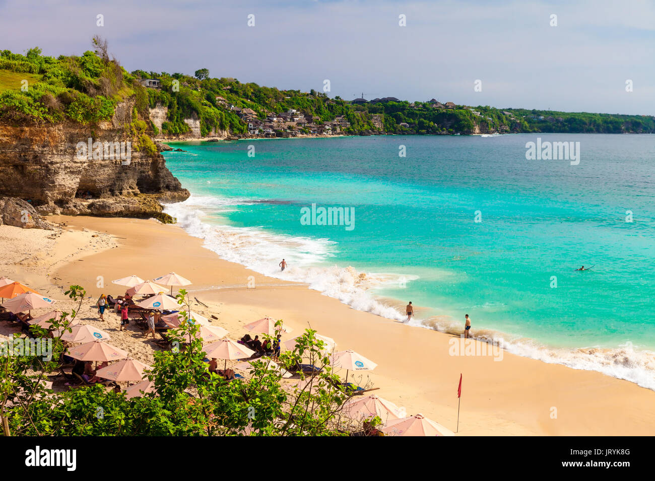 Bali seascape with huge waves at beautiful hidden white sand beach ...