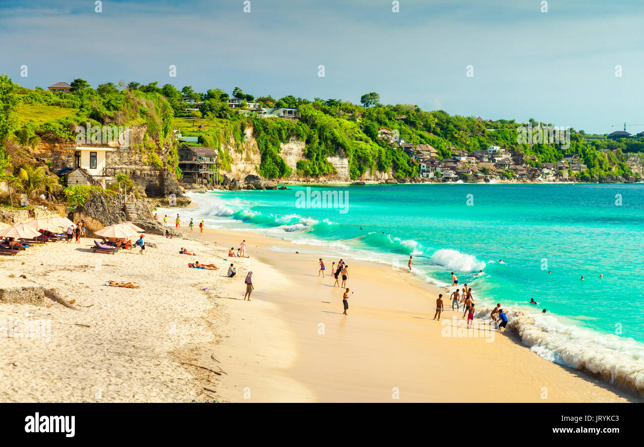 Bali seascape with huge waves at beautiful hidden white sand beach ...