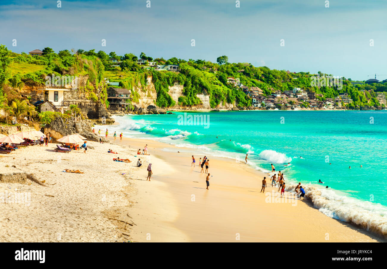 Bali seascape with huge waves at beautiful hidden white sand beach ...