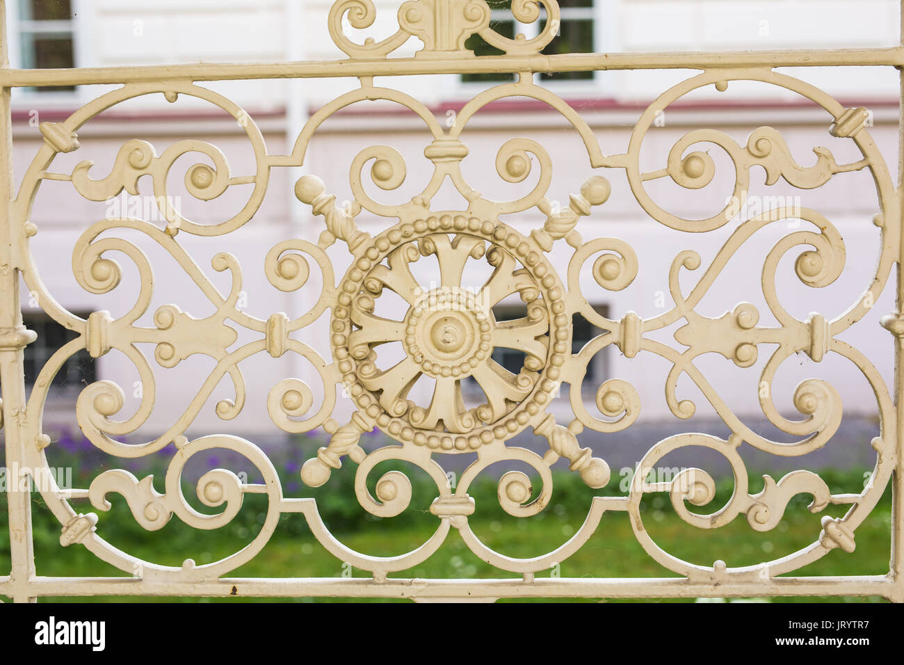 Forged decorative fence Stock Photo - Alamy