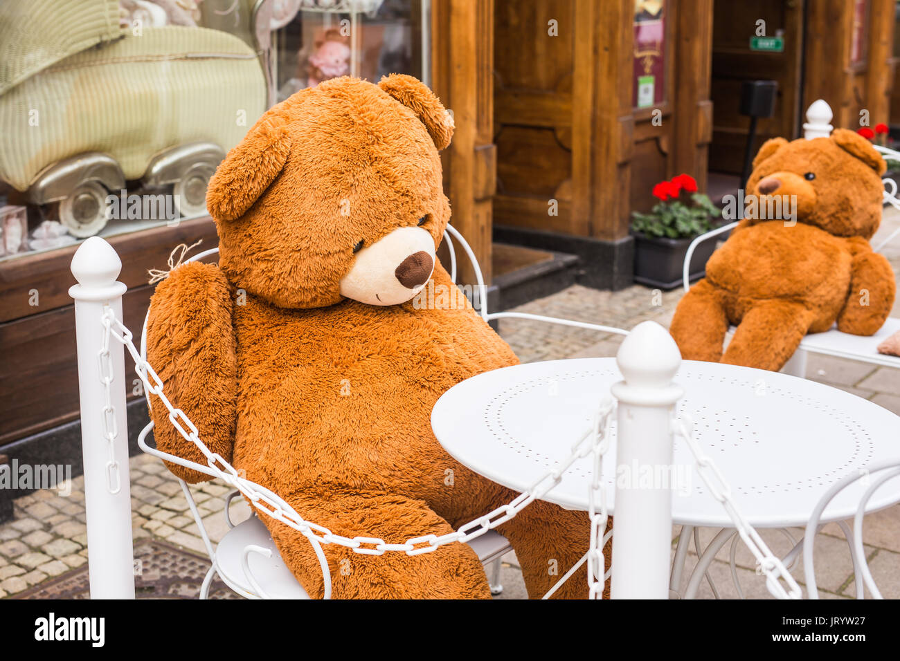 Teddy bear sitting on a chair hi-res stock photography and images - Alamy