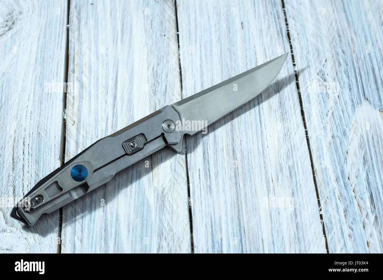Folding knife for everyday carrying. Metal knife Stock Photo - Alamy
