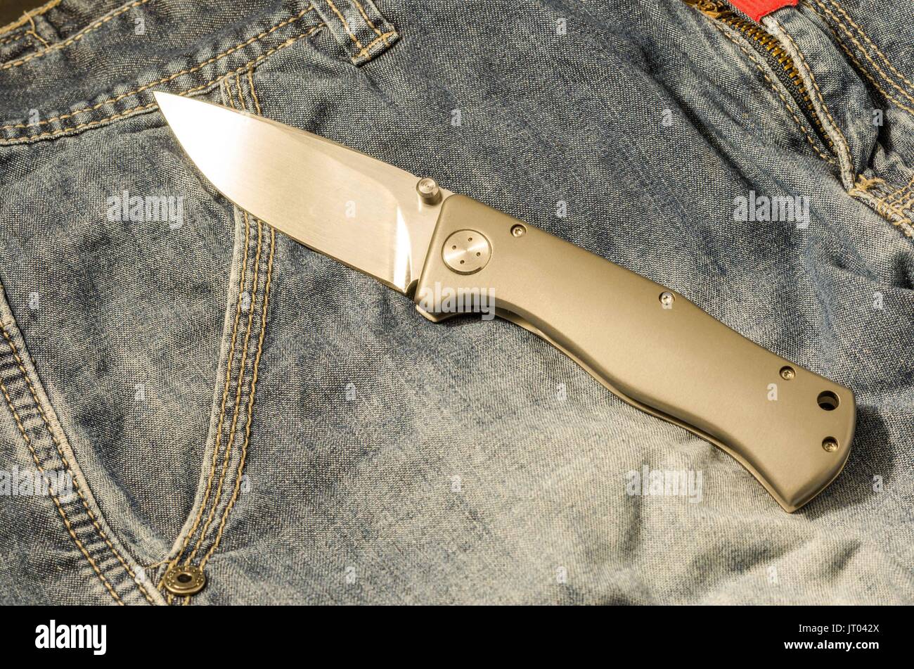 Folding knife with aluminum handle. Knife in the unfolded position ...