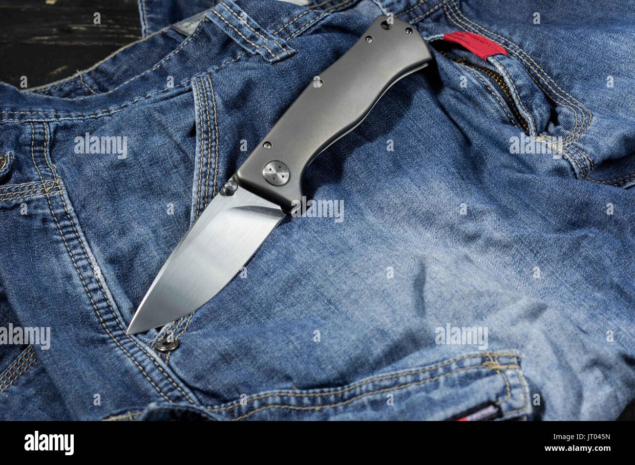 Folding knife with aluminum handle. Knife in the unfolded position ...