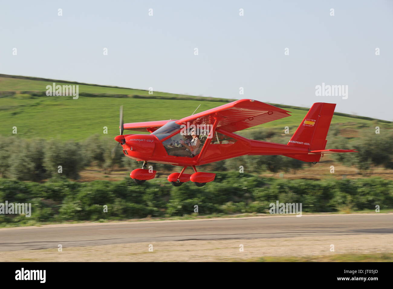 Red light aircraft taking off from Heliport, Andalucia, Spain Stock ...