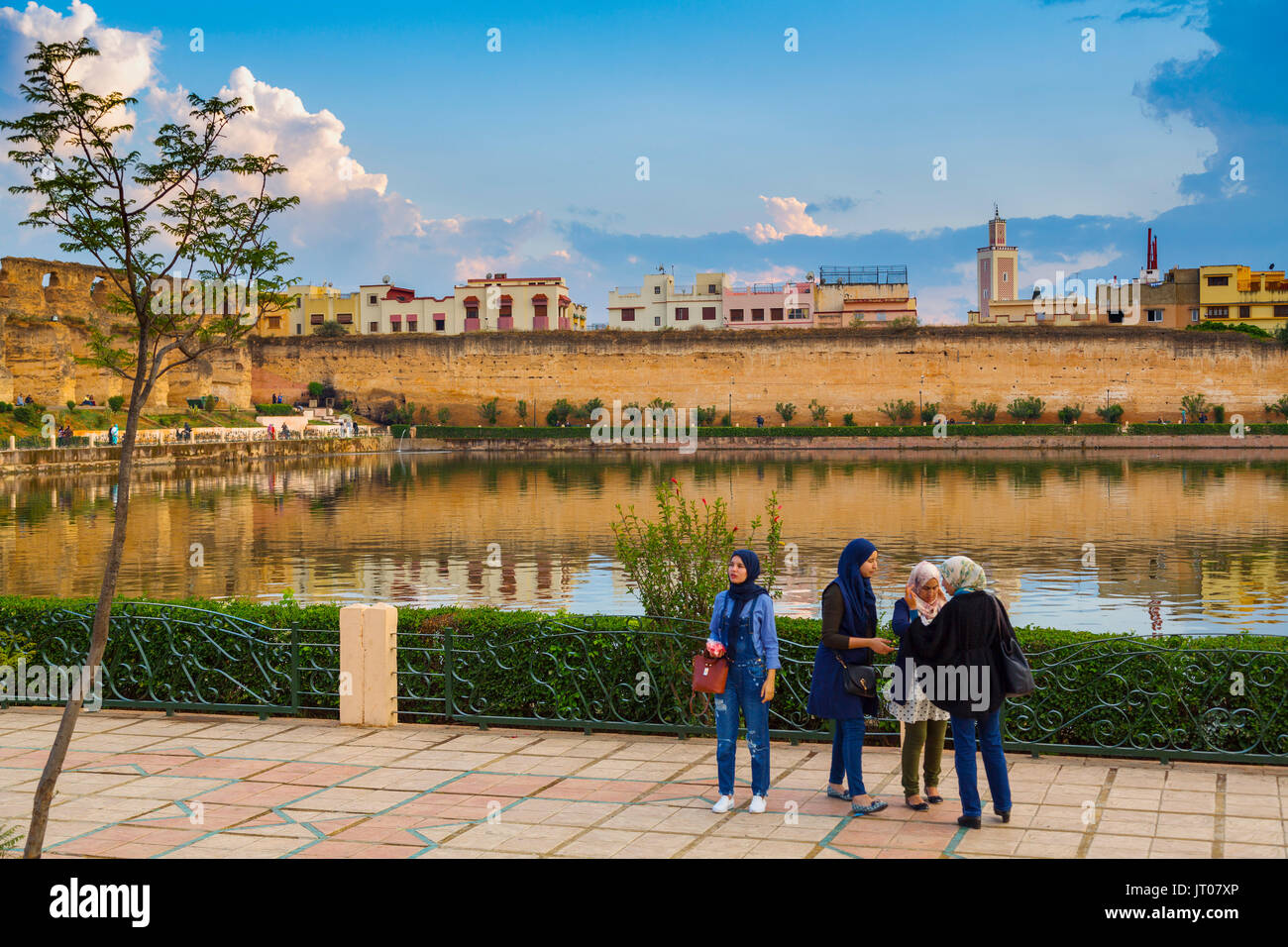 Street life scene. Sahrij Swani a basin lake reservoir, ancient ruined ...