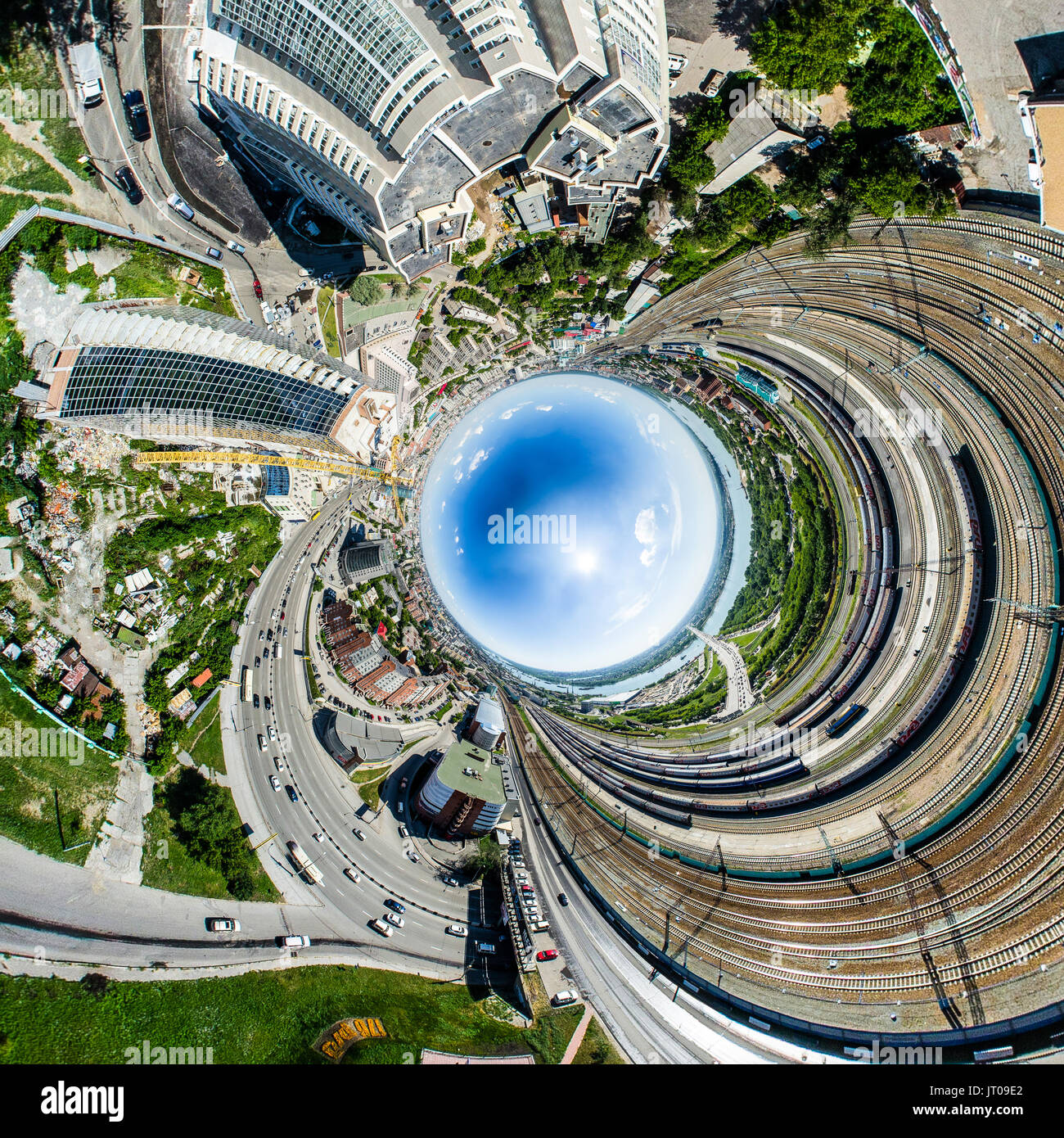 Aerial city view with crossroads, roads, houses, buildings, parks and ...