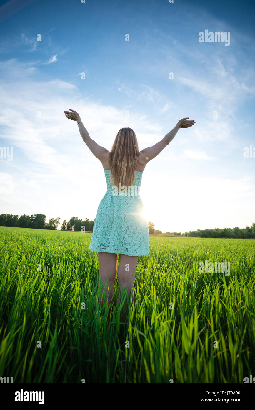 Woman sun worshiping hi-res stock photography and images - Alamy