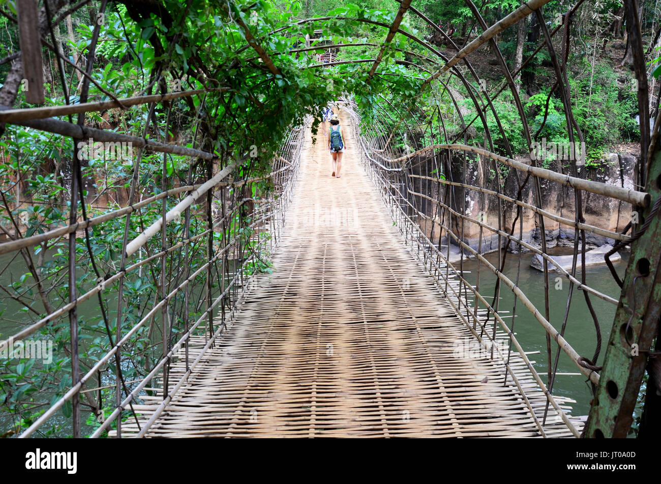 Suspension wooden and bamboo bridge for cross over stream river at Tad ...
