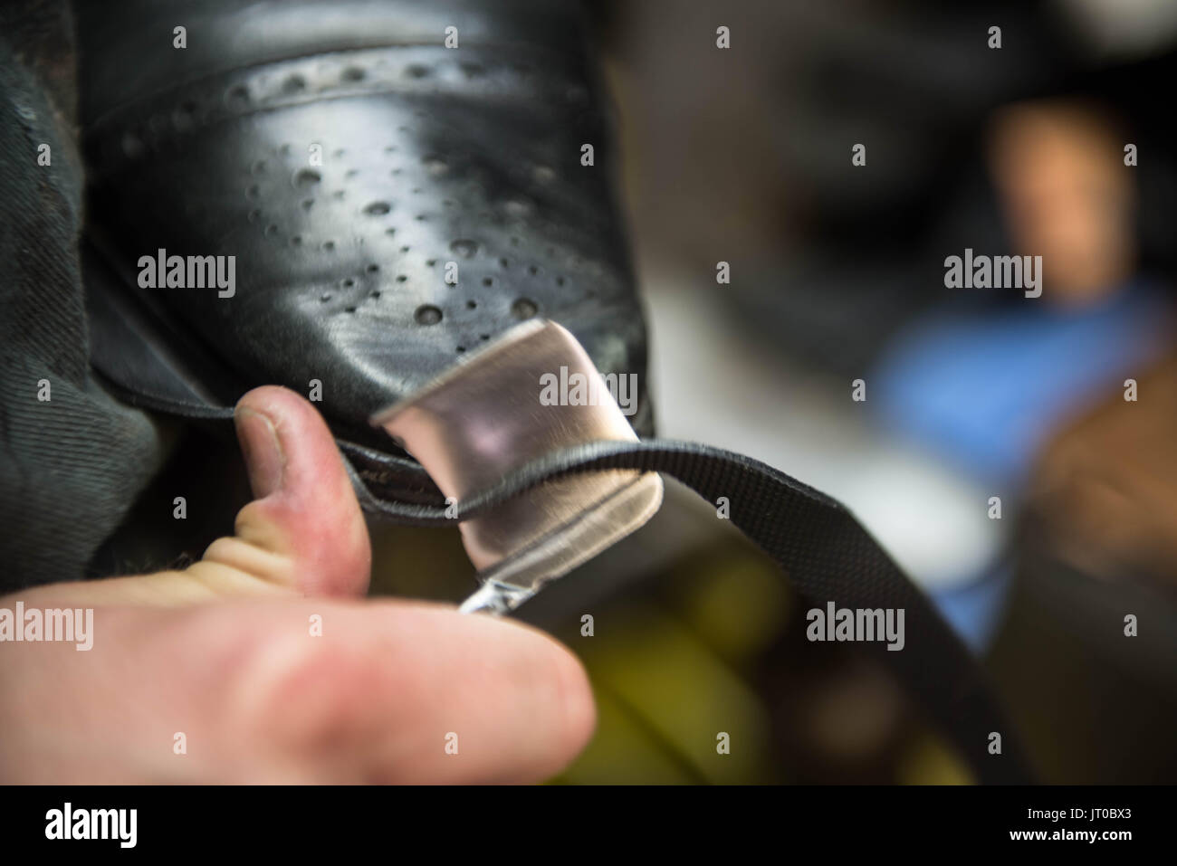 Close-up shots of shoe repair tools and footwear in a traditional ...
