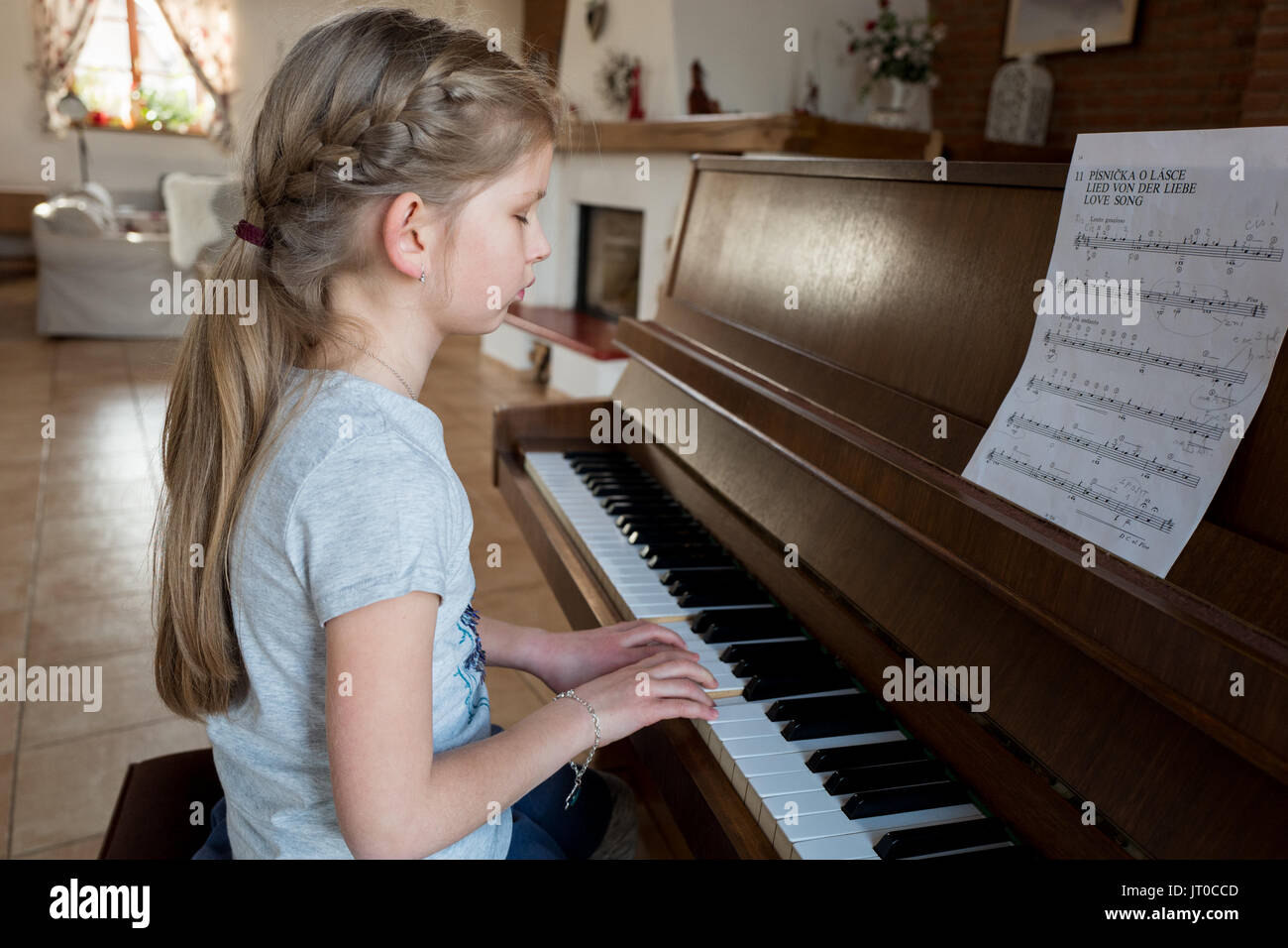 Teenagers practicing piano hi-res stock photography and images - Alamy