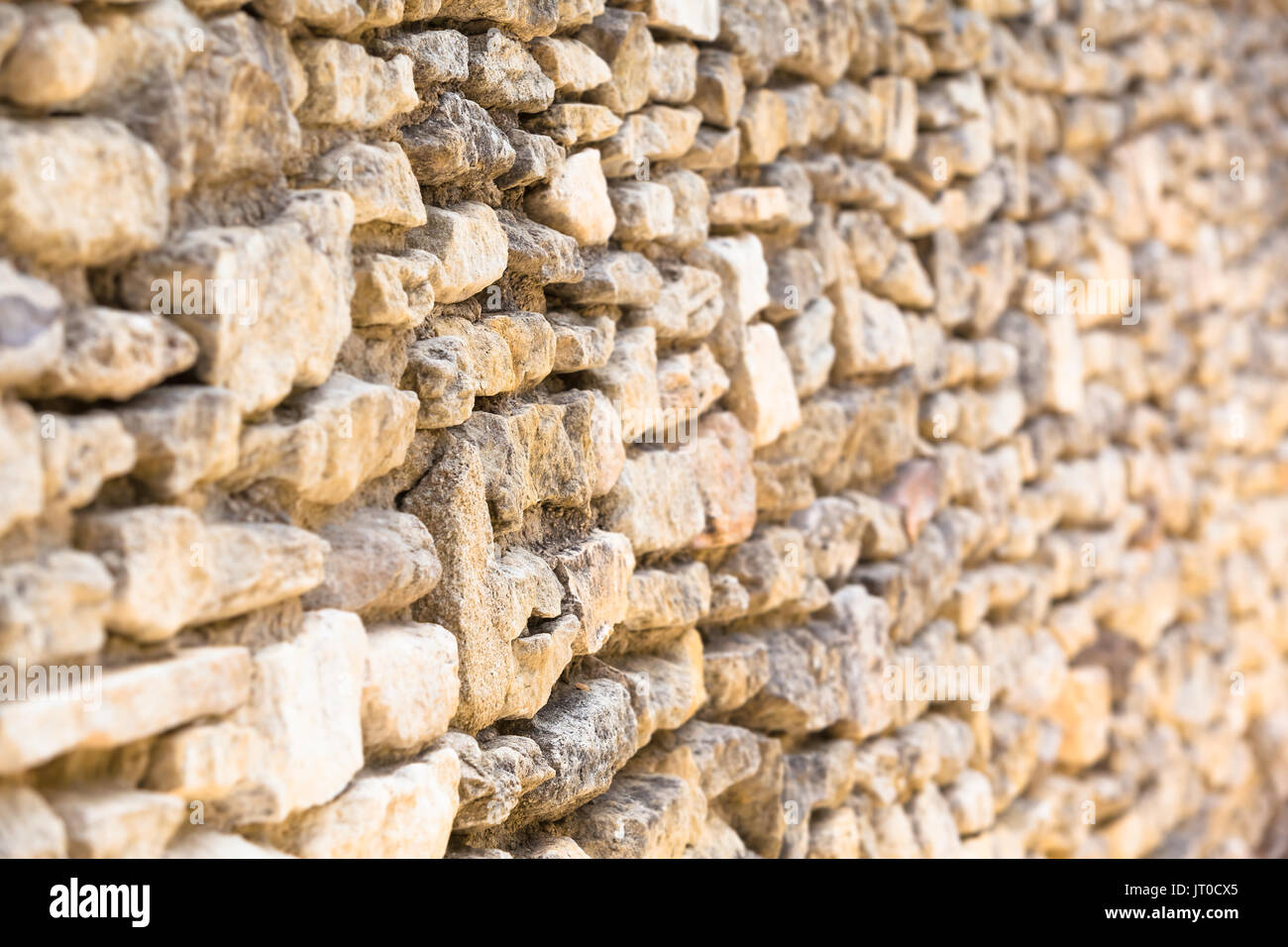 Blurred dry stone wall background hi-res stock photography and images ...