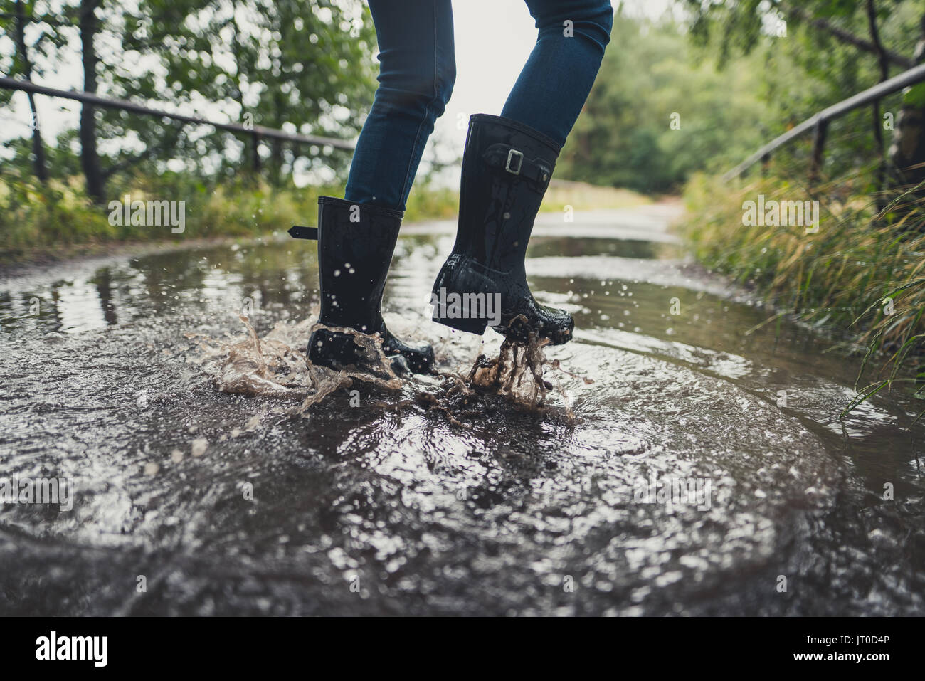 Woman dancing in rubber boots hi-res stock photography and images - Alamy