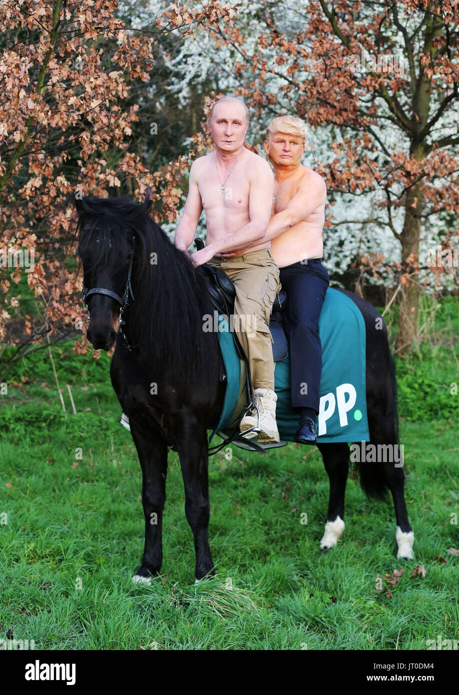 Actors in prosthetic make-up portraying Presidents Vladimir Putin and ...