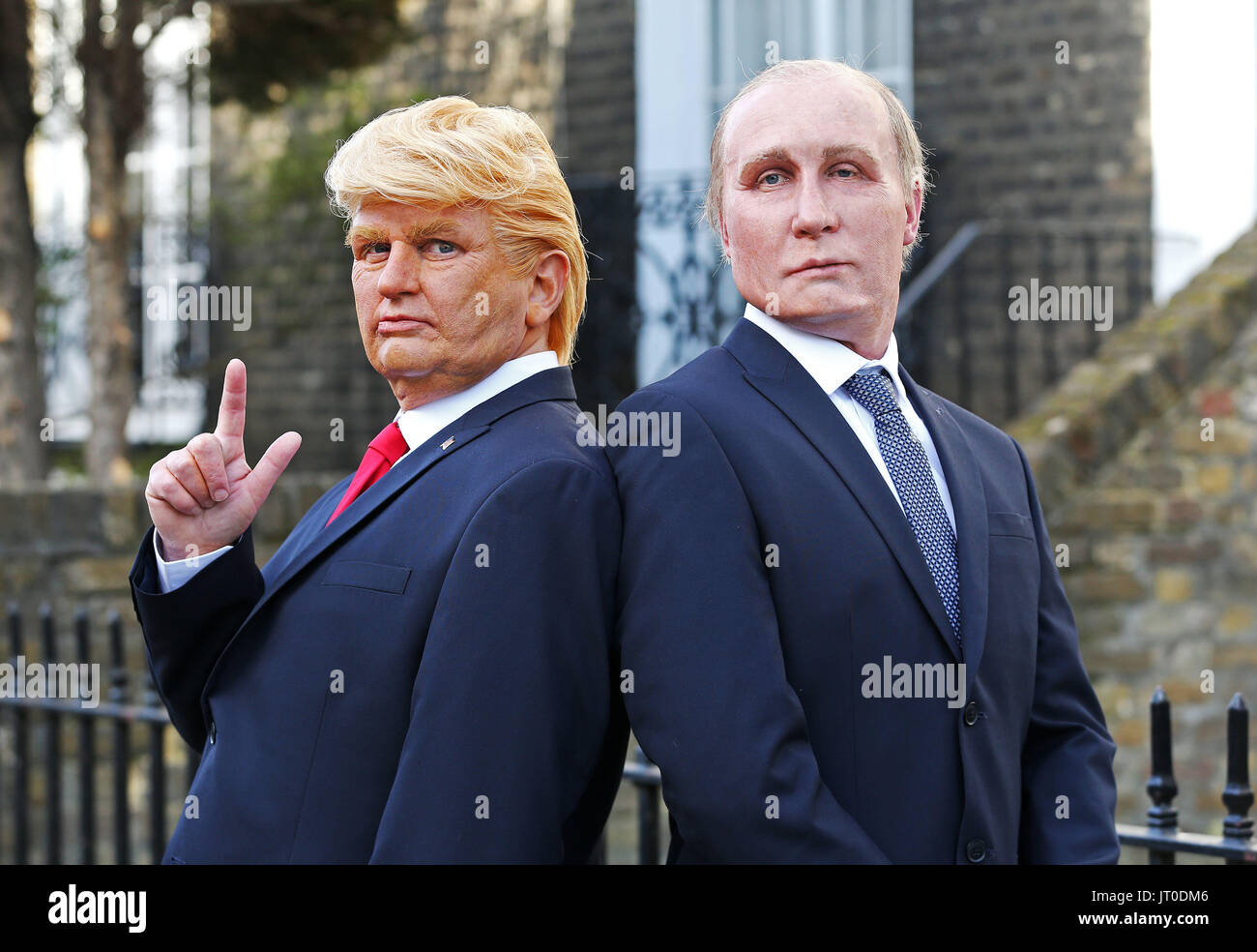 Actors in prosthetic make-up portraying Presidents Vladimir Putin and ...