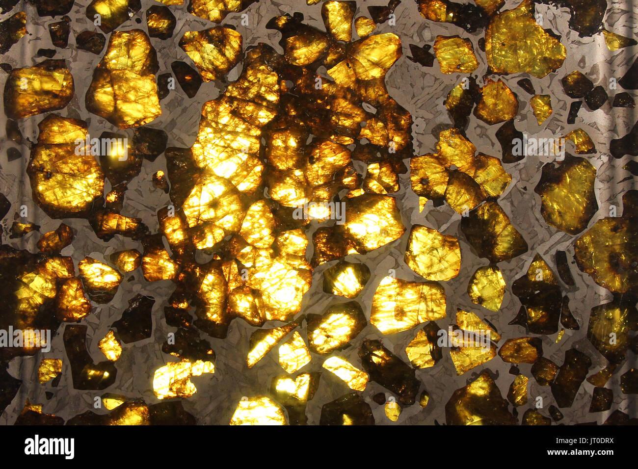 A stony-iron meteorite (pallasite) in a museum in Nantes (France Stock ...