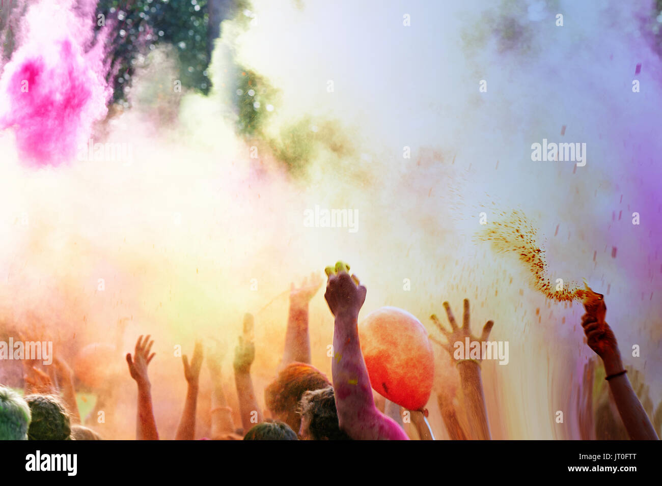 The festival of Indian colors Holi.The time of the throw. Hands Stock ...