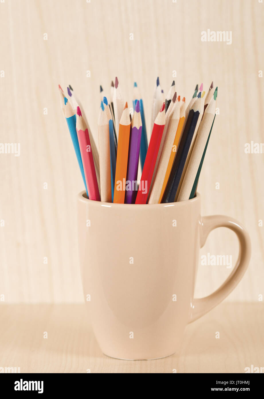 Color pencils in cup Stock Photo - Alamy
