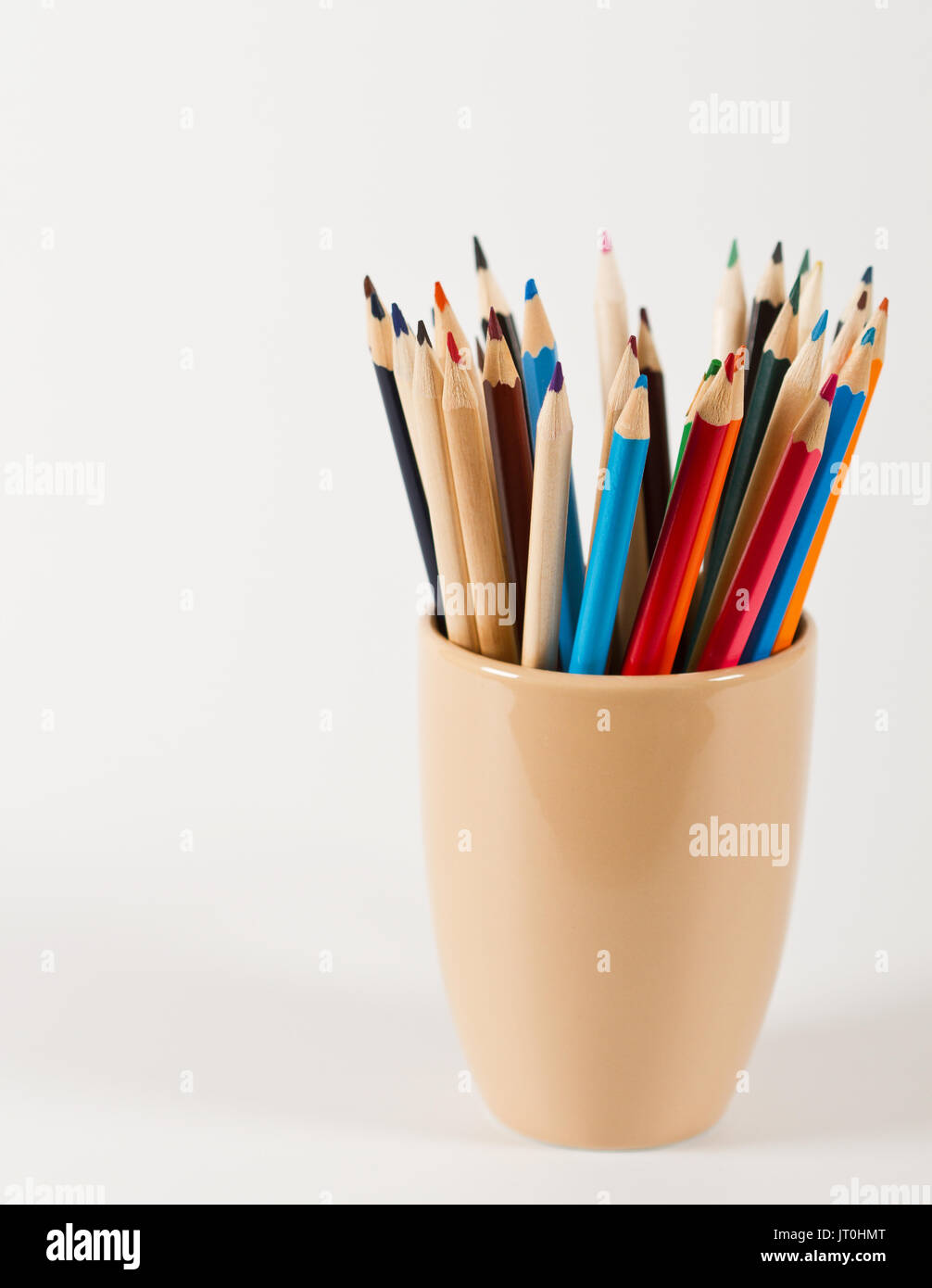 Color pencils in cup Stock Photo - Alamy