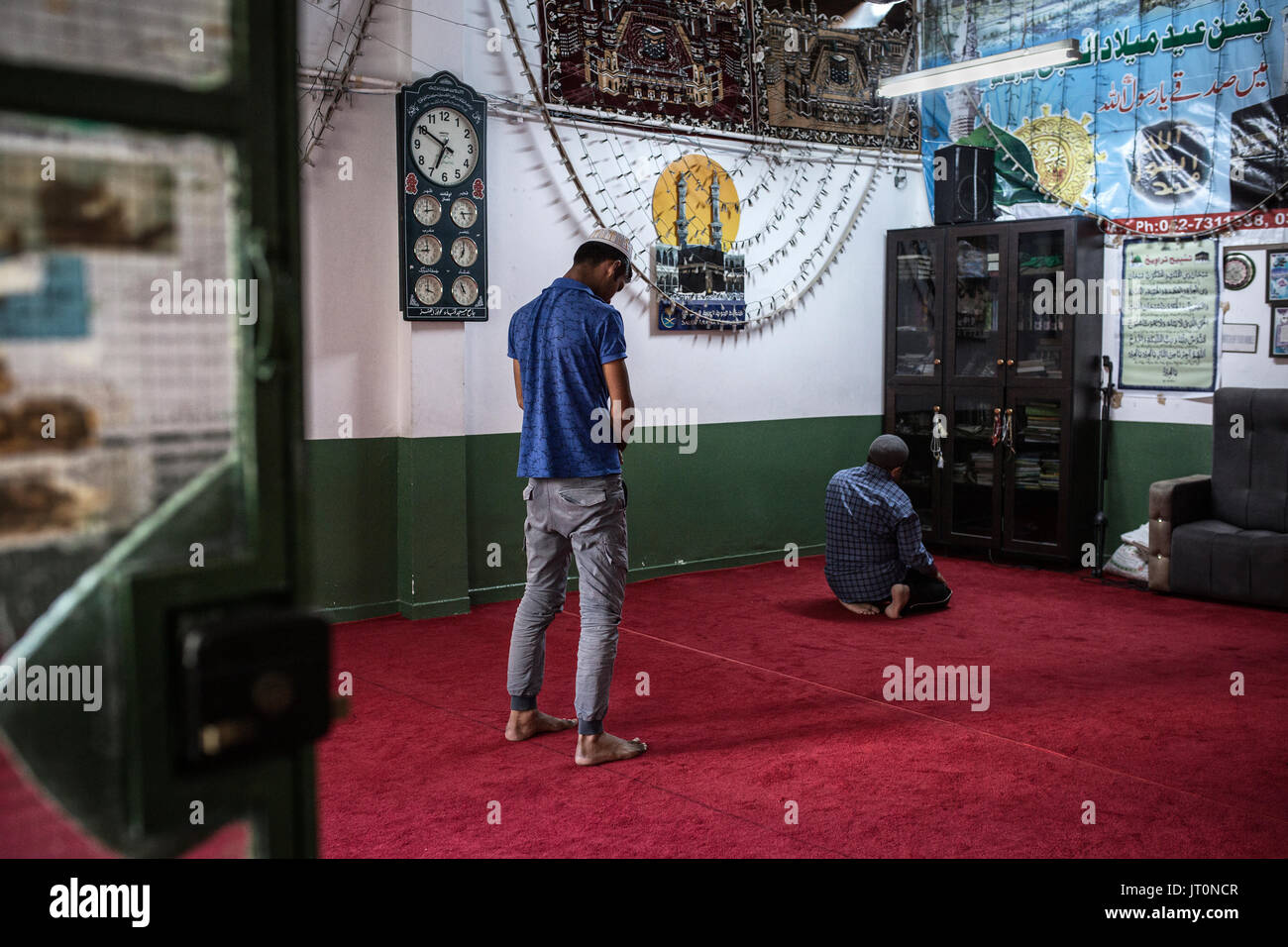 Athens, Greece. 6th July, 2017. A Muslim is praying in the provisonal ...