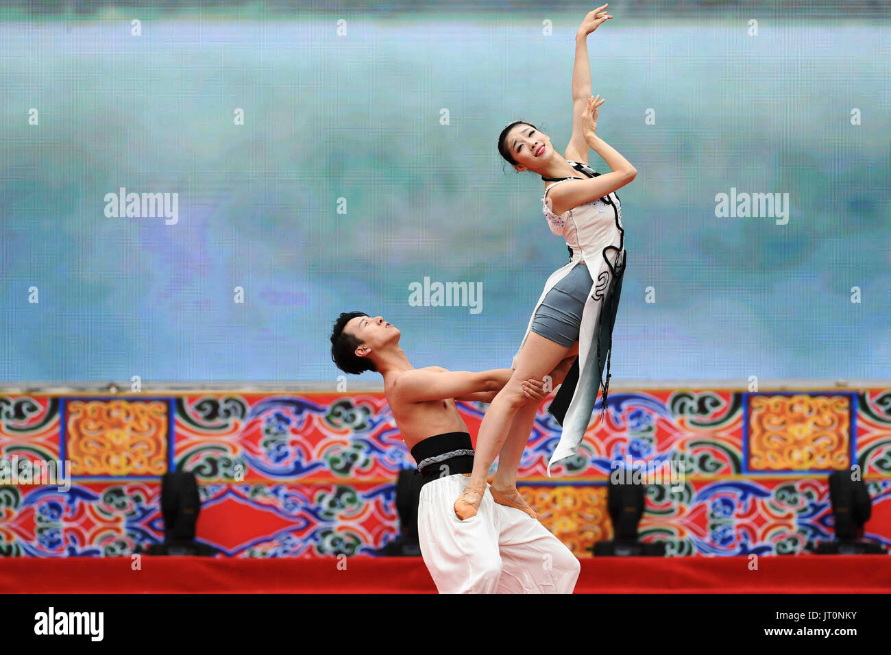 Luqu. 6th Aug, 2017. Dancers perform during the opening ceremony of the ...