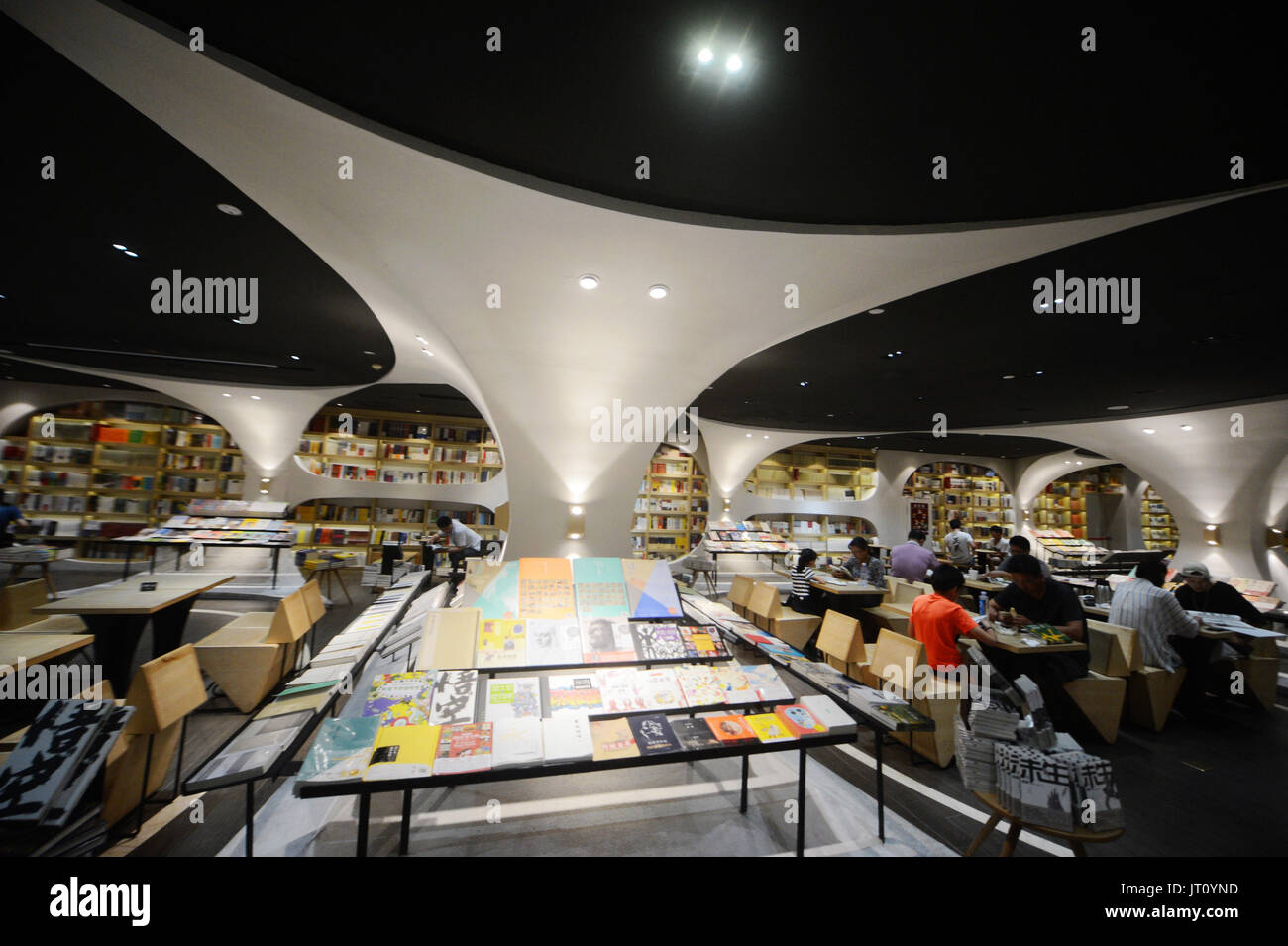 Yangzhou, China's Jiangsu Province. 7th Aug, 2017. People read at ...