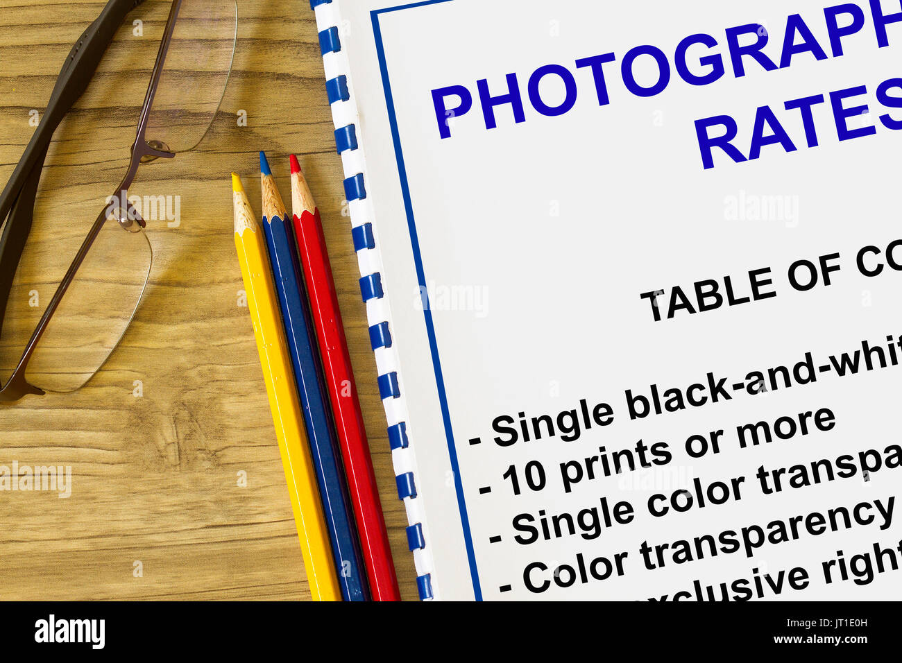 Photography rates concept- with index on a cover sheet Stock Photo - Alamy